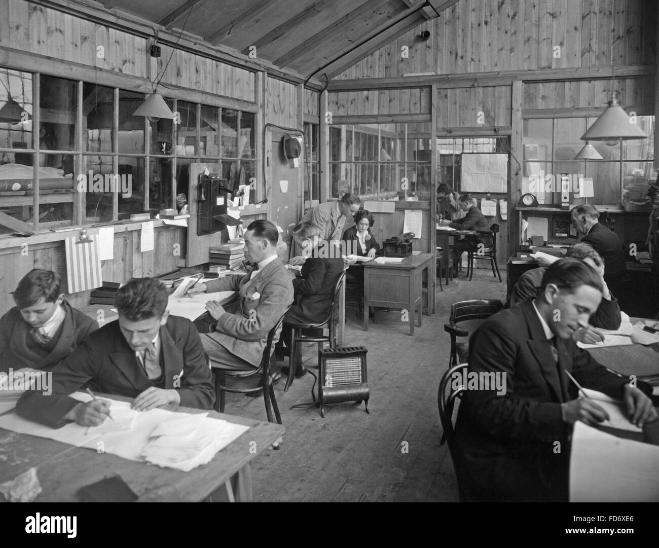 Office workers at their desk, 1931 Stock Photo - Alamy