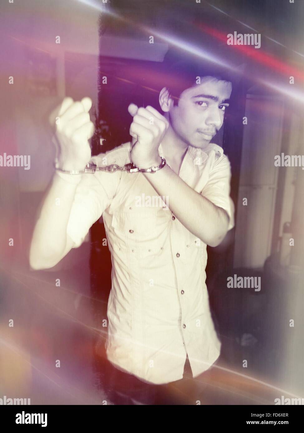 Man handcuffs hi-res stock photography and images - Alamy