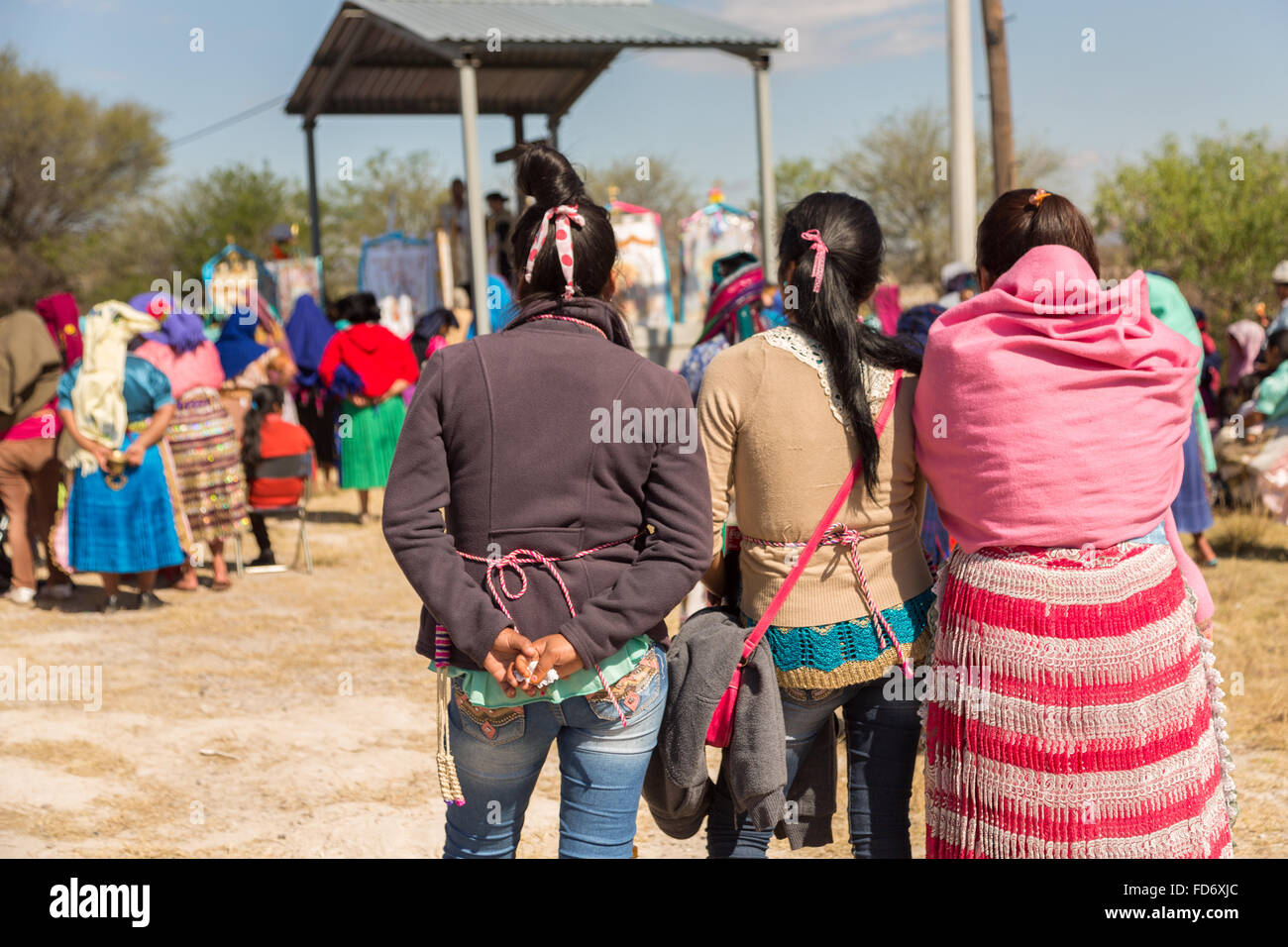 Indigenous pilgrims listen to an outdoor mass on the pilgrimage route ...