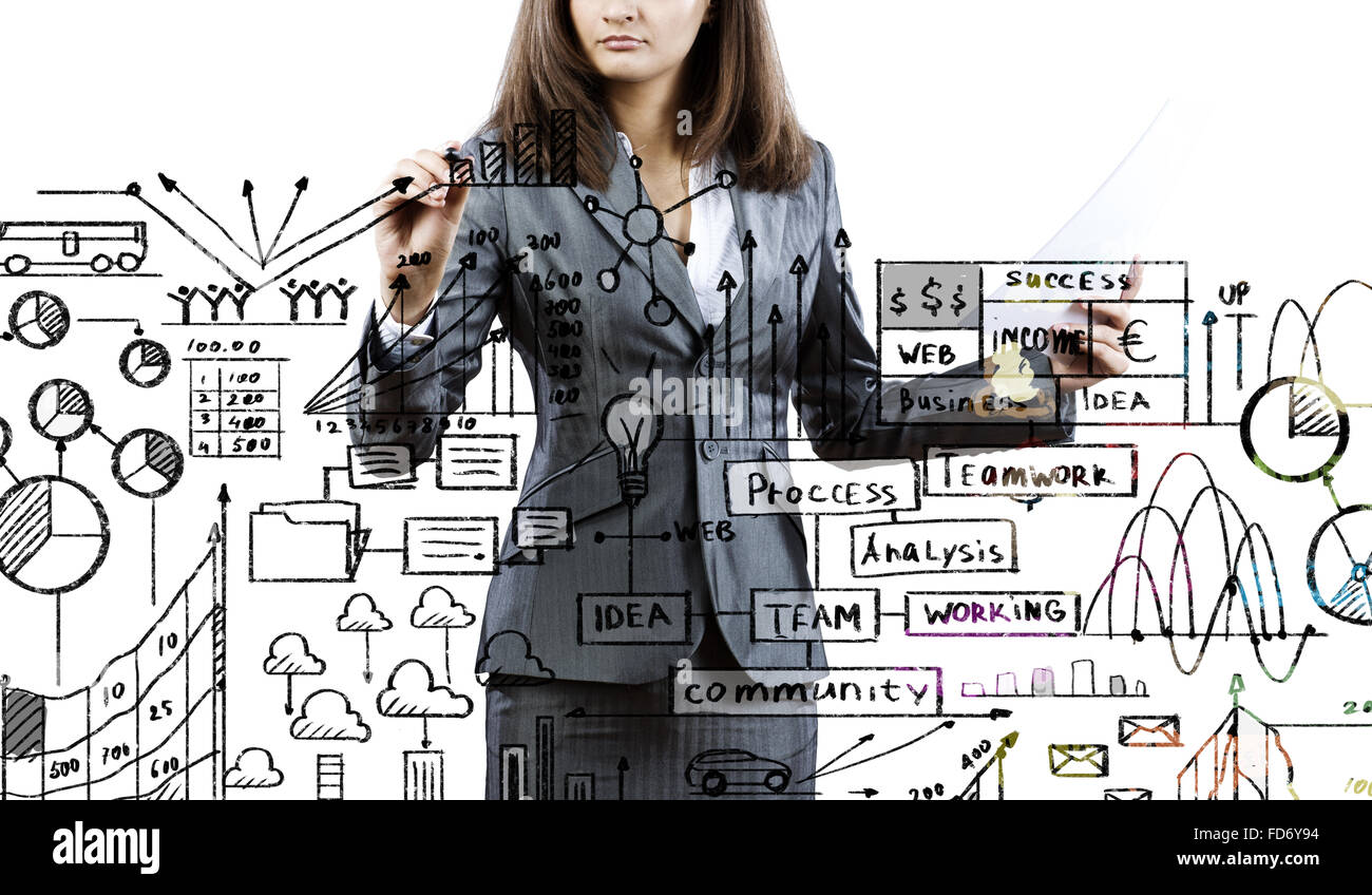 Businesswoman drawing business plan and sketches with marker Stock ...