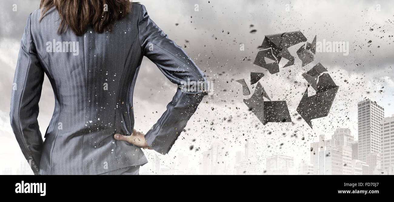 Back view of businesswoman with stone recycle symbol Stock Photo - Alamy