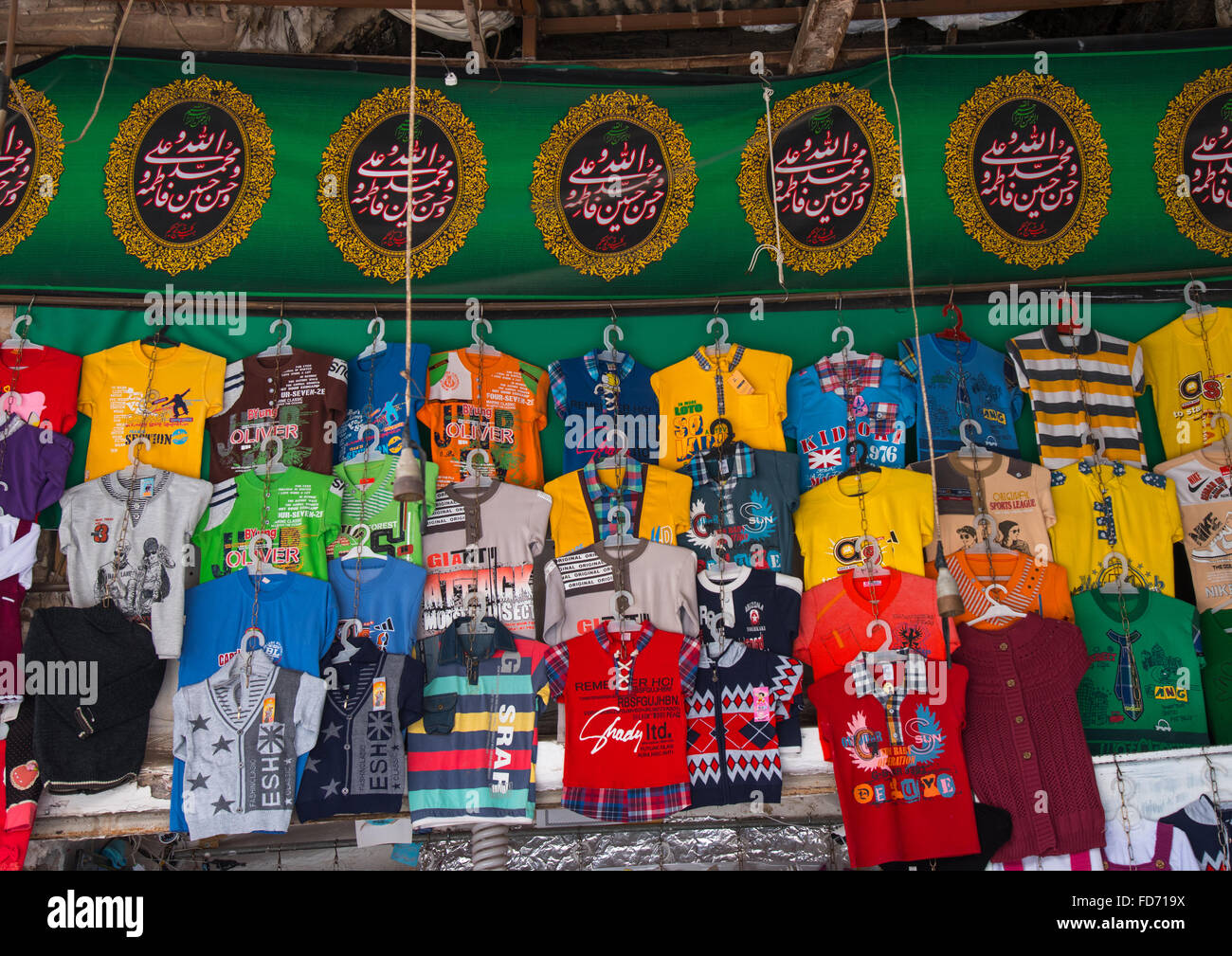 made in china shits below shia banners in ganjali bazaar, Central ...