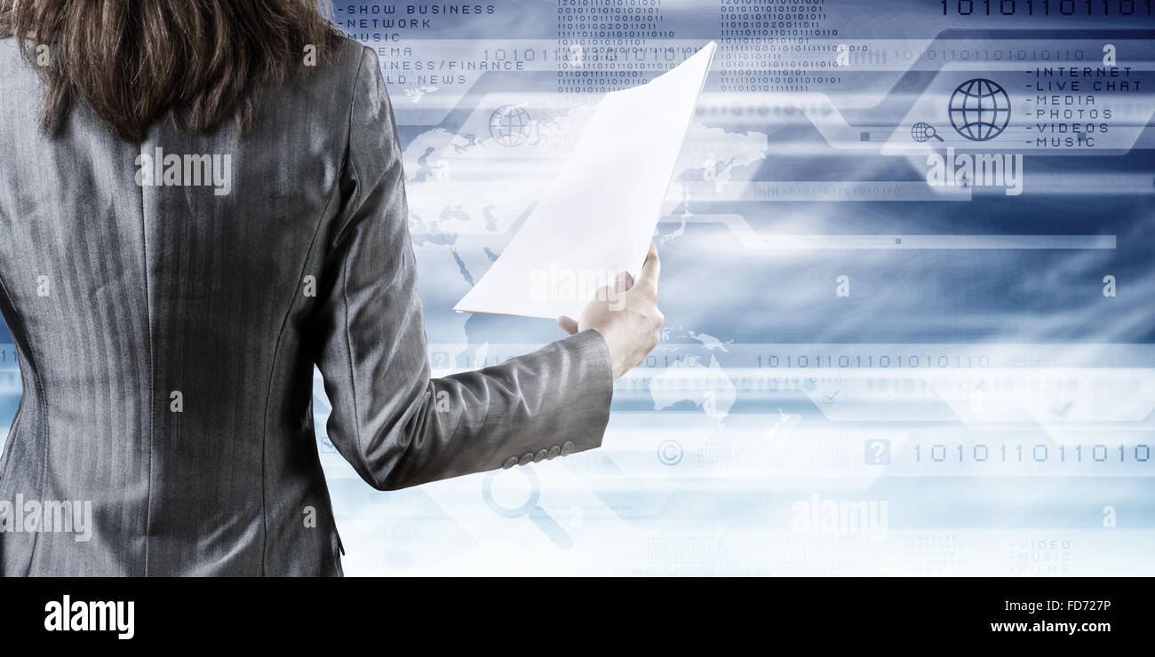 Back view of businesswoman holding papers in hands Stock Photo - Alamy