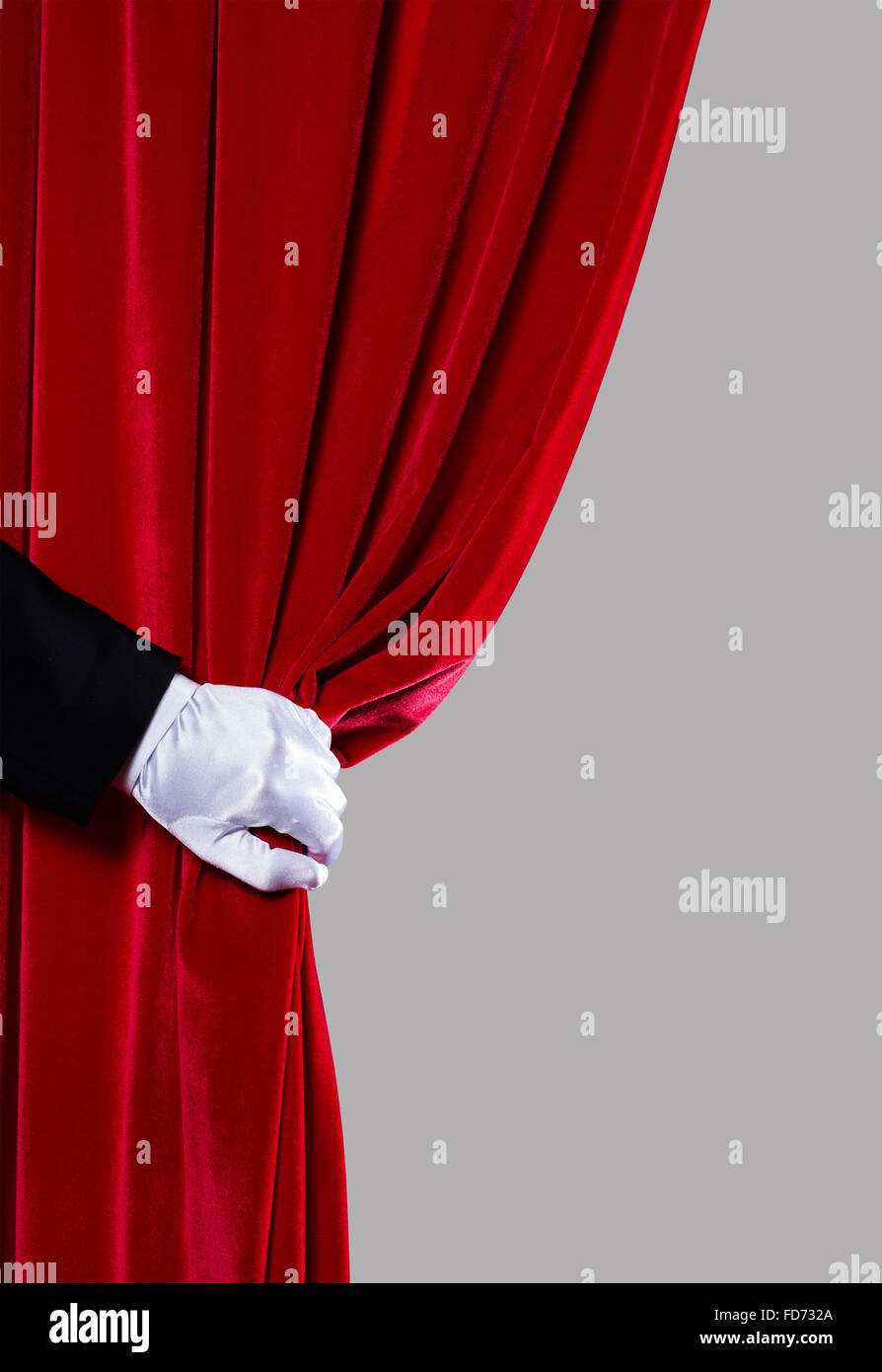 Close up of hand in white glove open the curtain. Place for text Stock ...