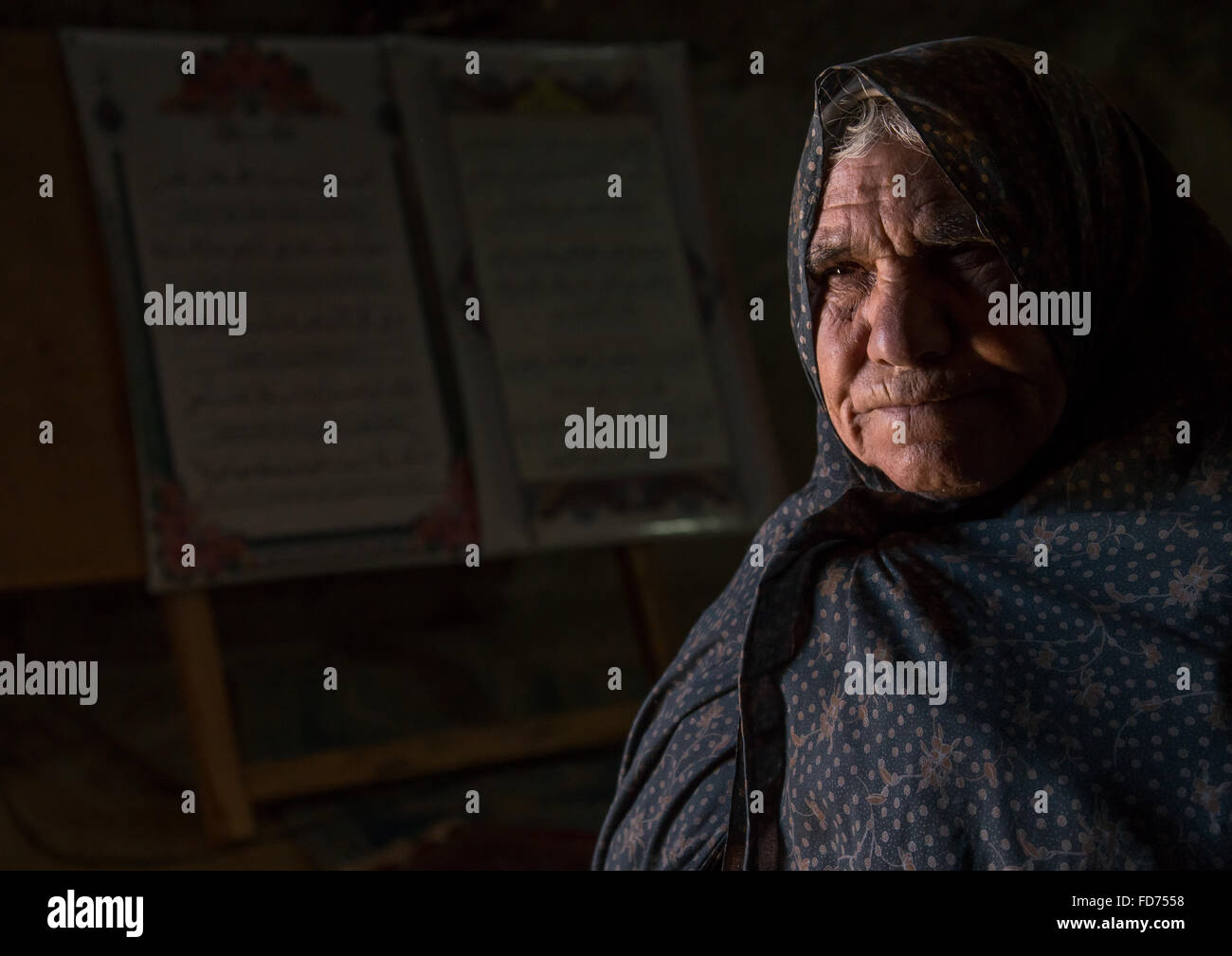 old widow woman inside the mosque of the troglodyte village, Kerman ...