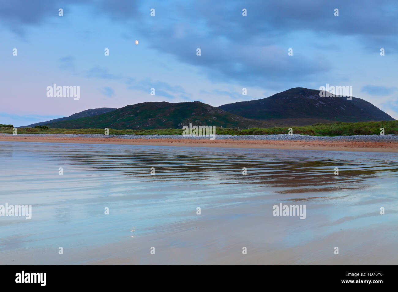 moon over the Beach of the Tullagh Bay on peninsula Inishowen, Donegal ...