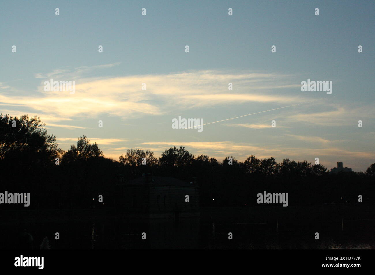 sunset over central park Stock Photo - Alamy