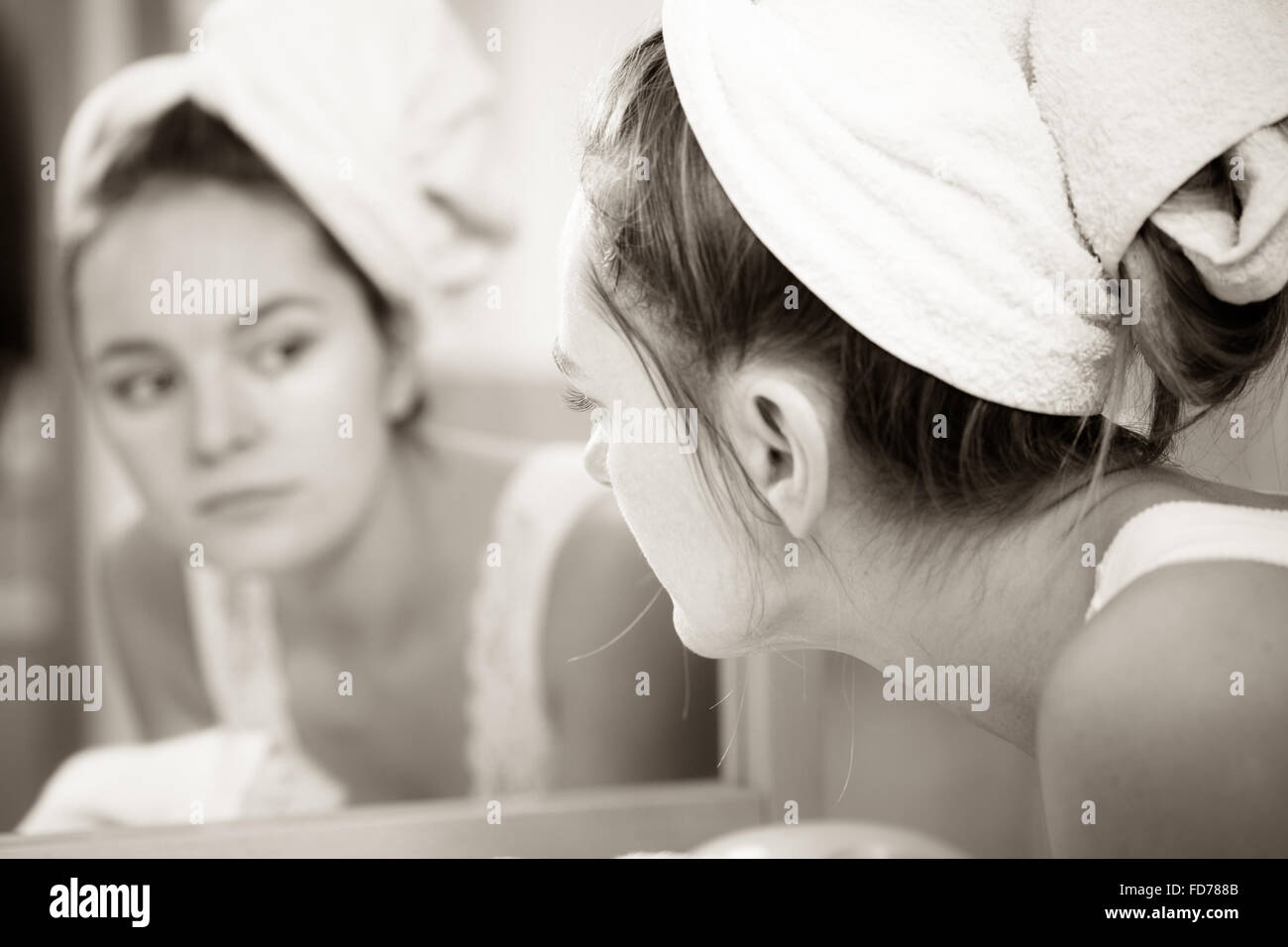 Woman cleaning washing her face with clean water in bathroom. Girl ...