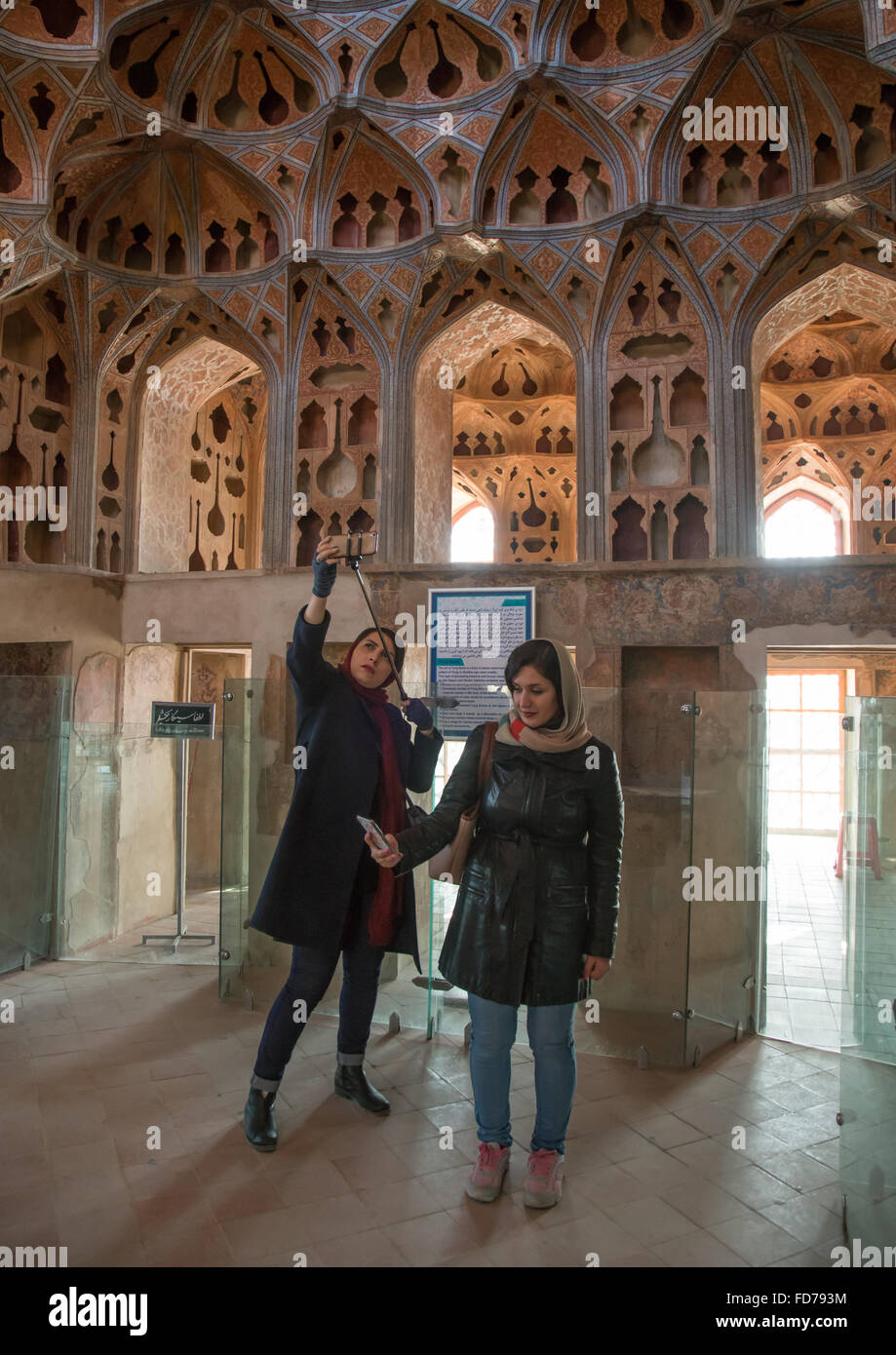 iranian women taking selfie picture in the acoustic ceiling in the ...