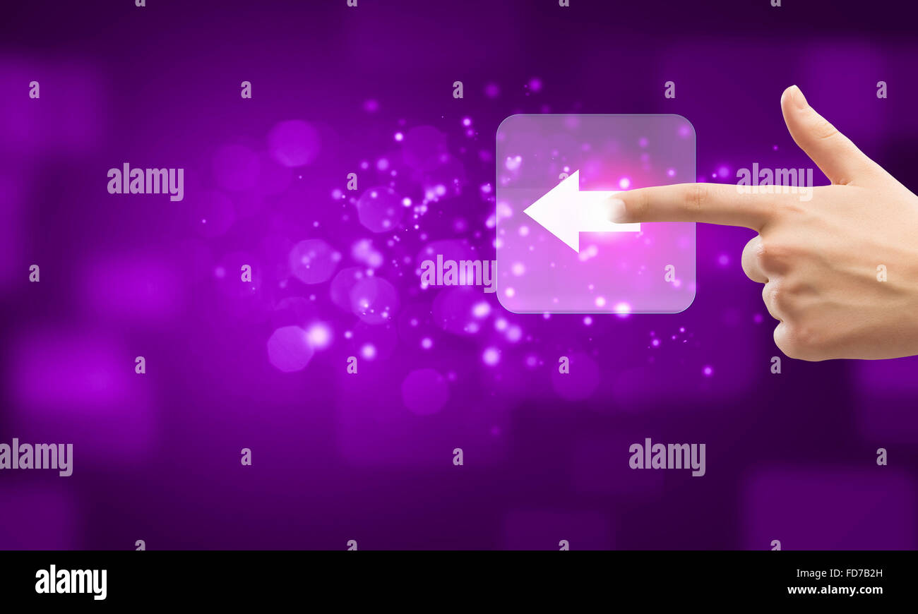 Close up of hand pushing icon of media player Stock Photo - Alamy