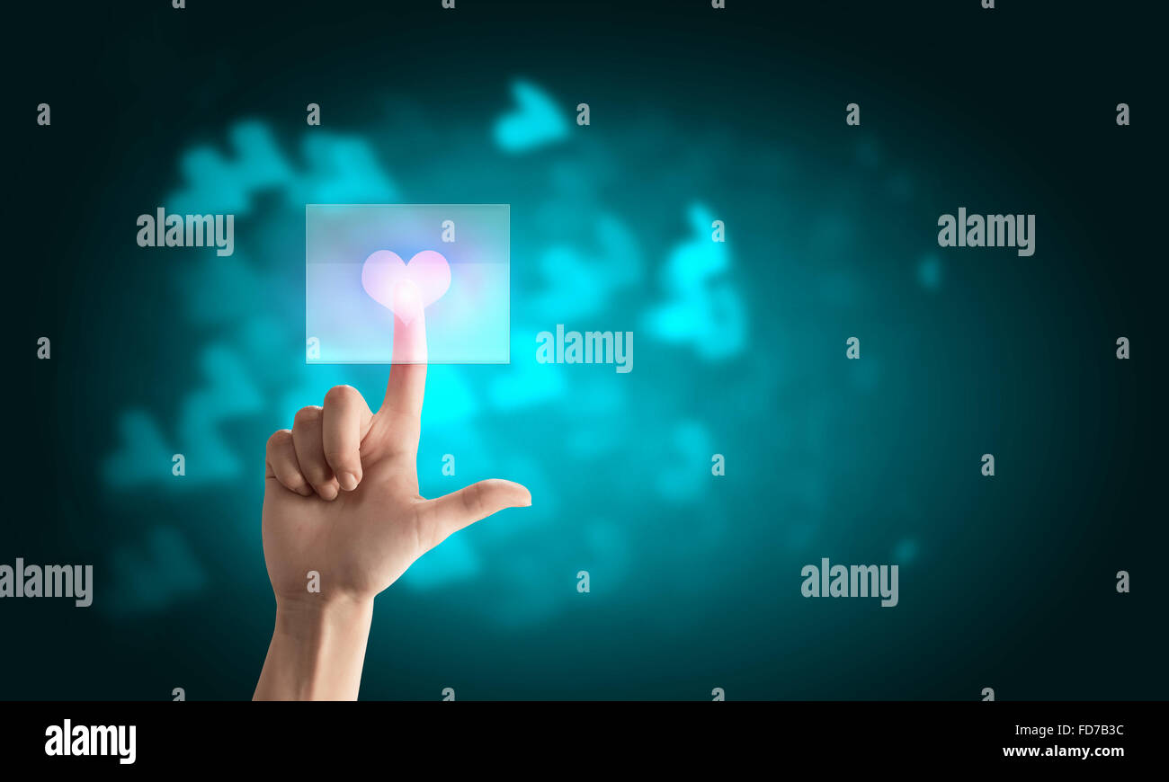 Close up of human hand pushing icon of media screen Stock Photo - Alamy