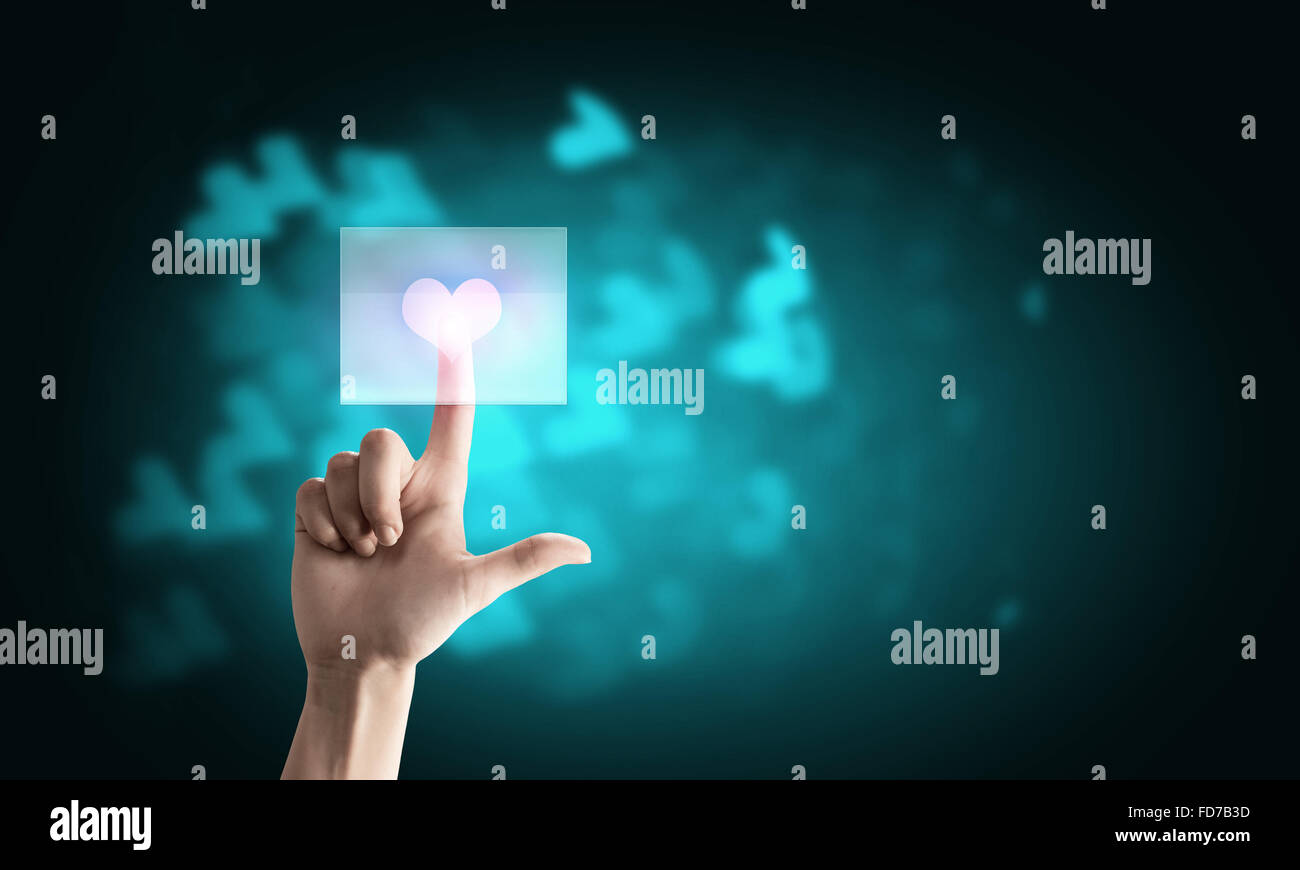 Close up of human hand pushing icon of media screen Stock Photo - Alamy