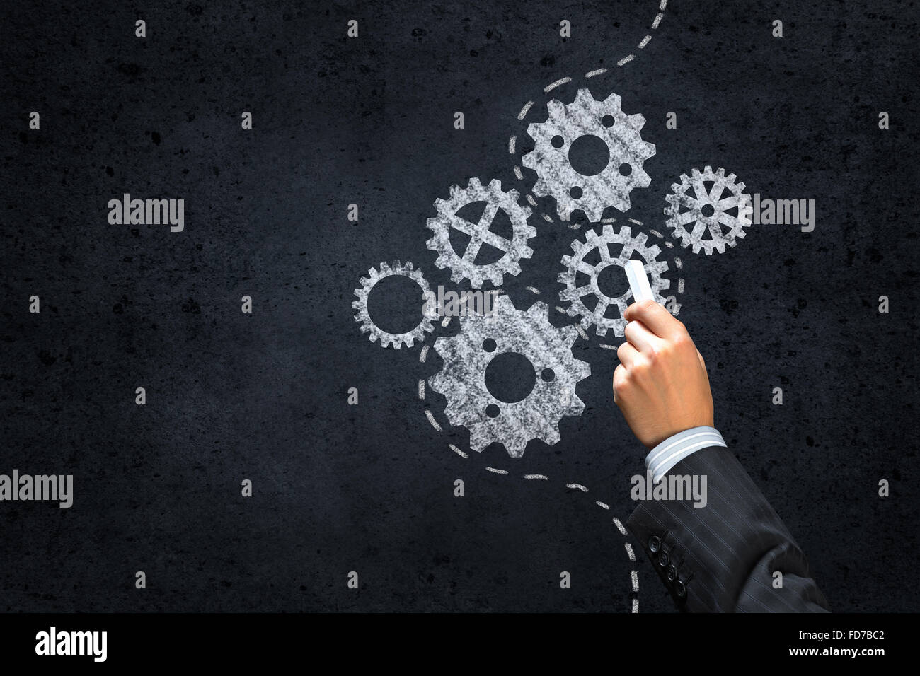 Close up of hand drawing gears mechanism with chalk Stock Photo - Alamy
