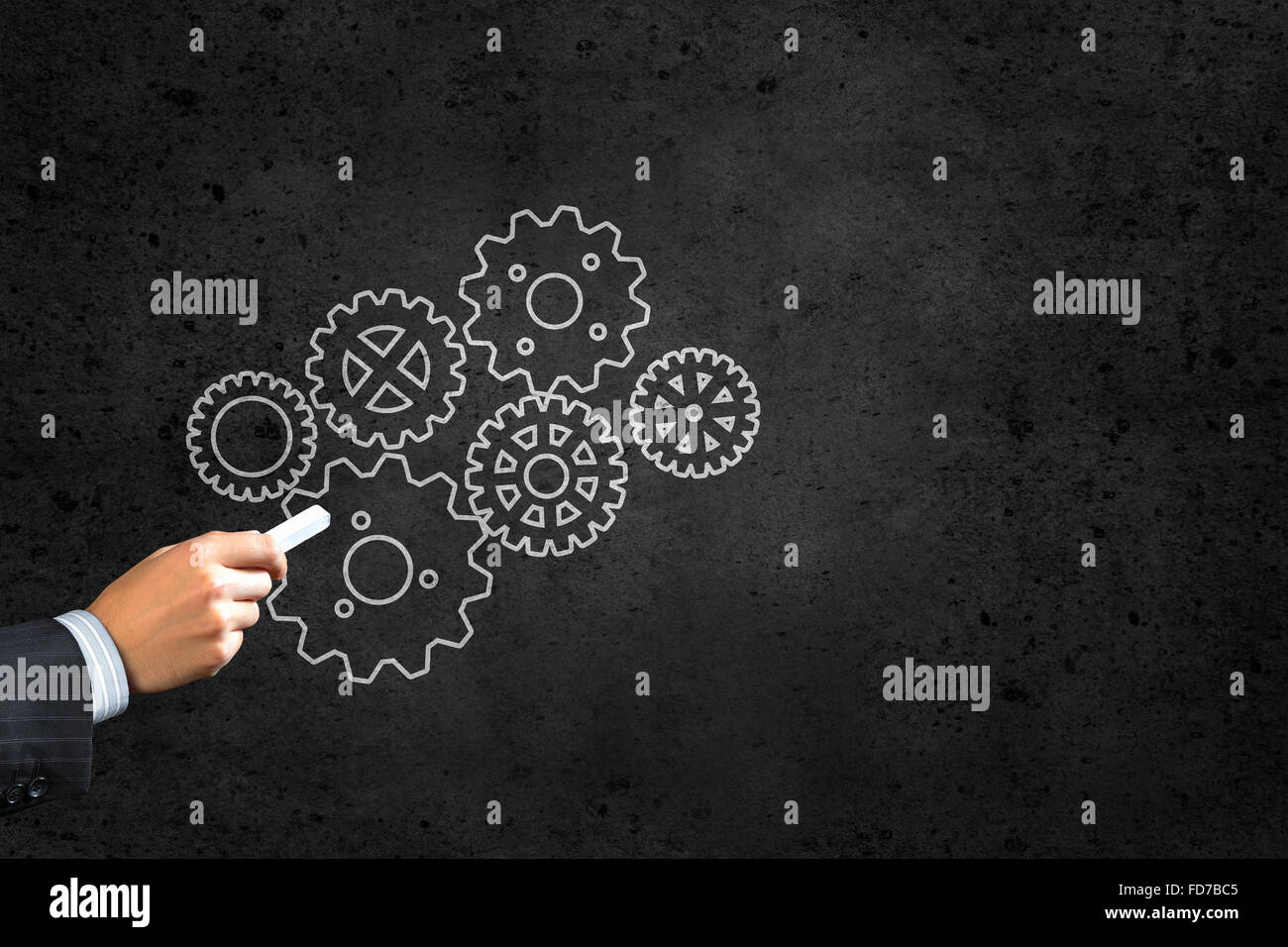 Close up of hand drawing gears mechanism with chalk Stock Photo - Alamy