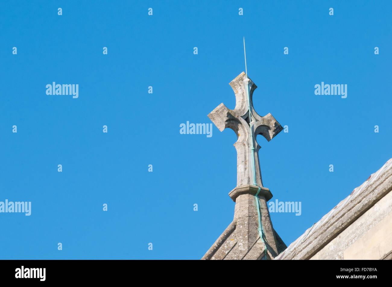 Roof top cross with blue sky background Stock Photo - Alamy