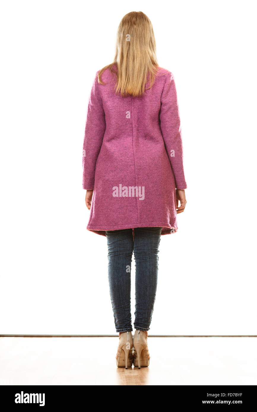 Fashion. Young blonde fashionable woman in vivid color pink coat ...