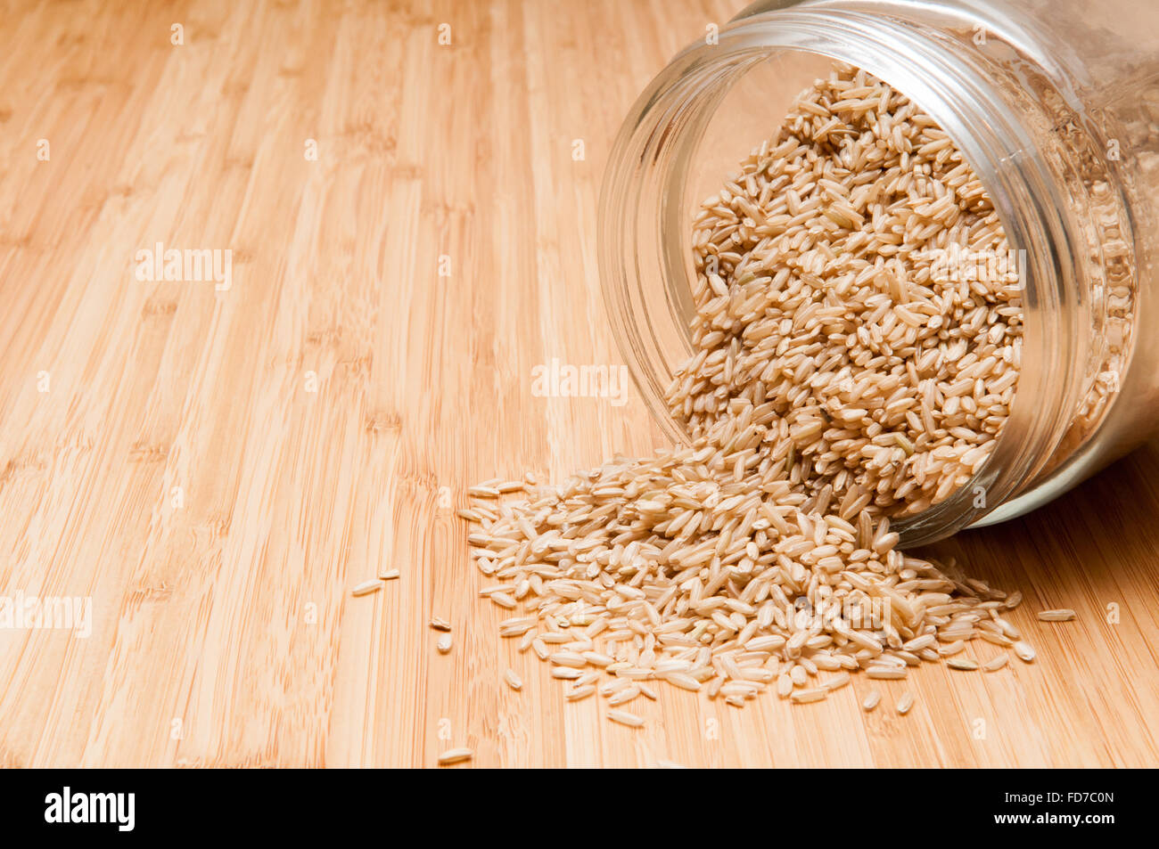Close up pouring brown rice hi-res stock photography and images - Alamy