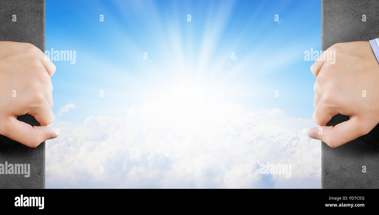 Close up of hand moving a part stone wall Stock Photo - Alamy