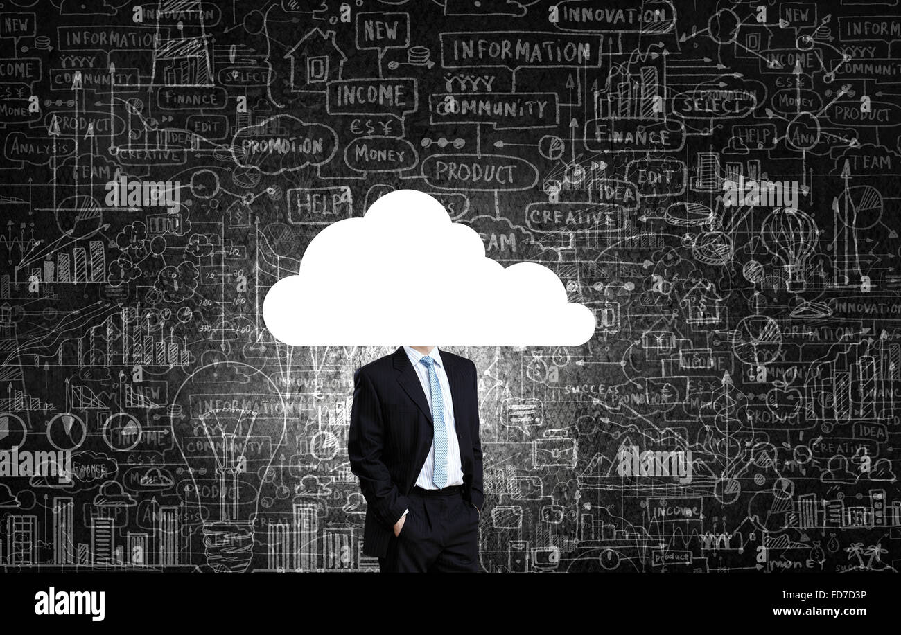 Businessman standing with his head in cloud Stock Photo - Alamy