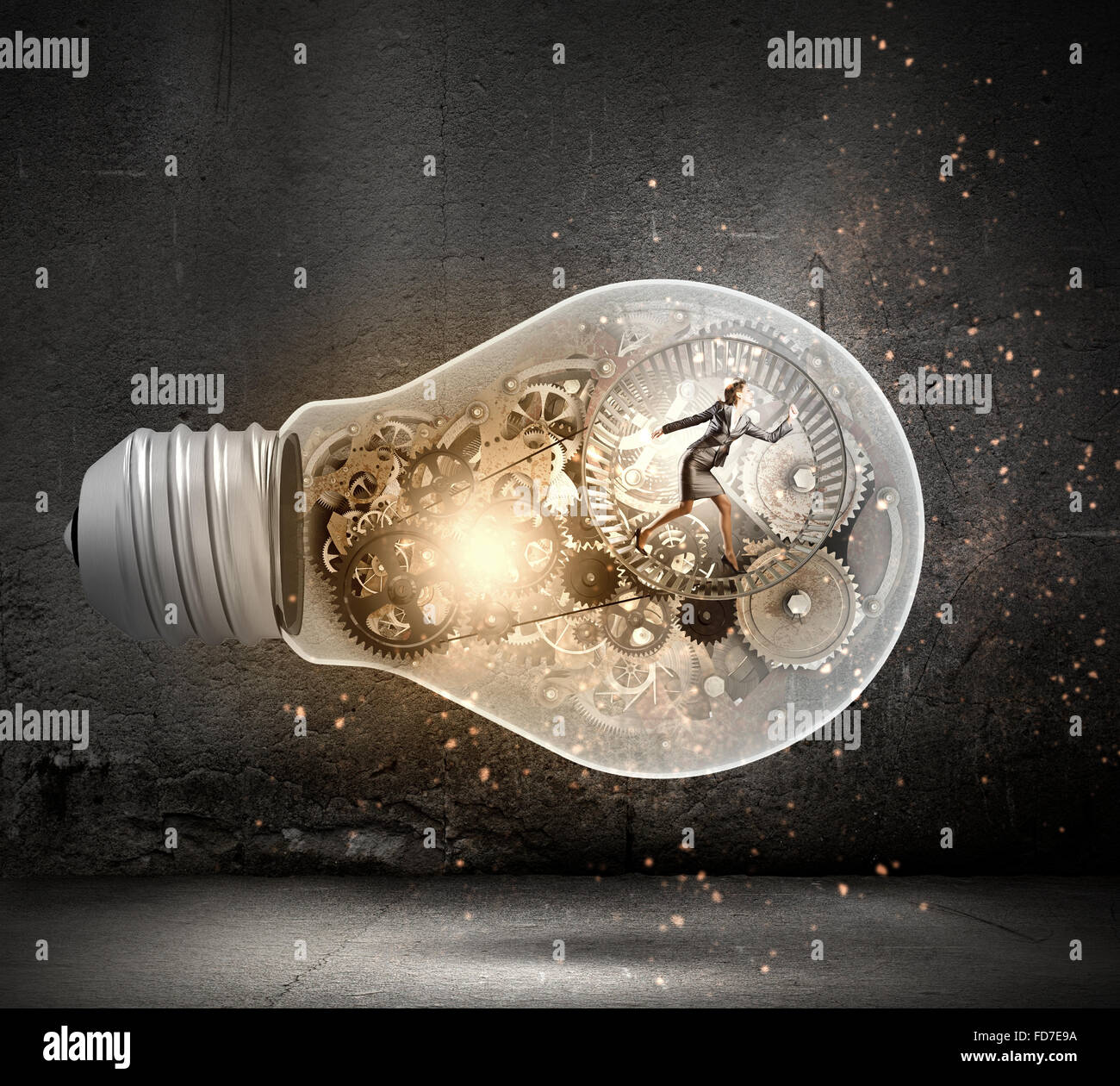 Young businesswoman running in wheel of gears mechanism Stock Photo - Alamy