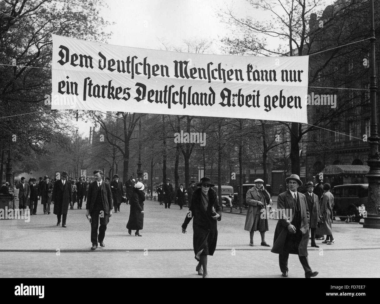 Propaganda banner in Berlin on Labor Day, 1933 Stock Photo - Alamy