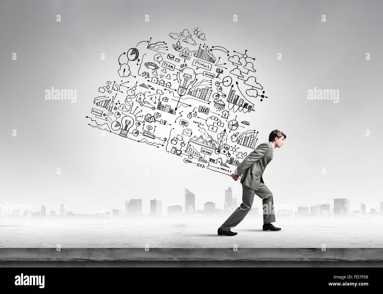 Young businessman carrying out ideas of business plan Stock Photo - Alamy