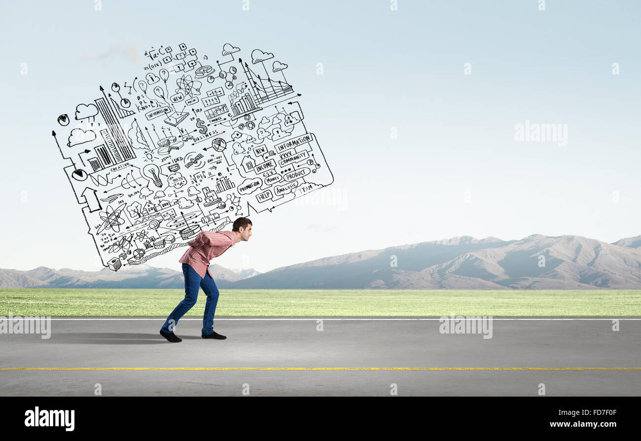Young businessman carrying out ideas of business plan Stock Photo - Alamy