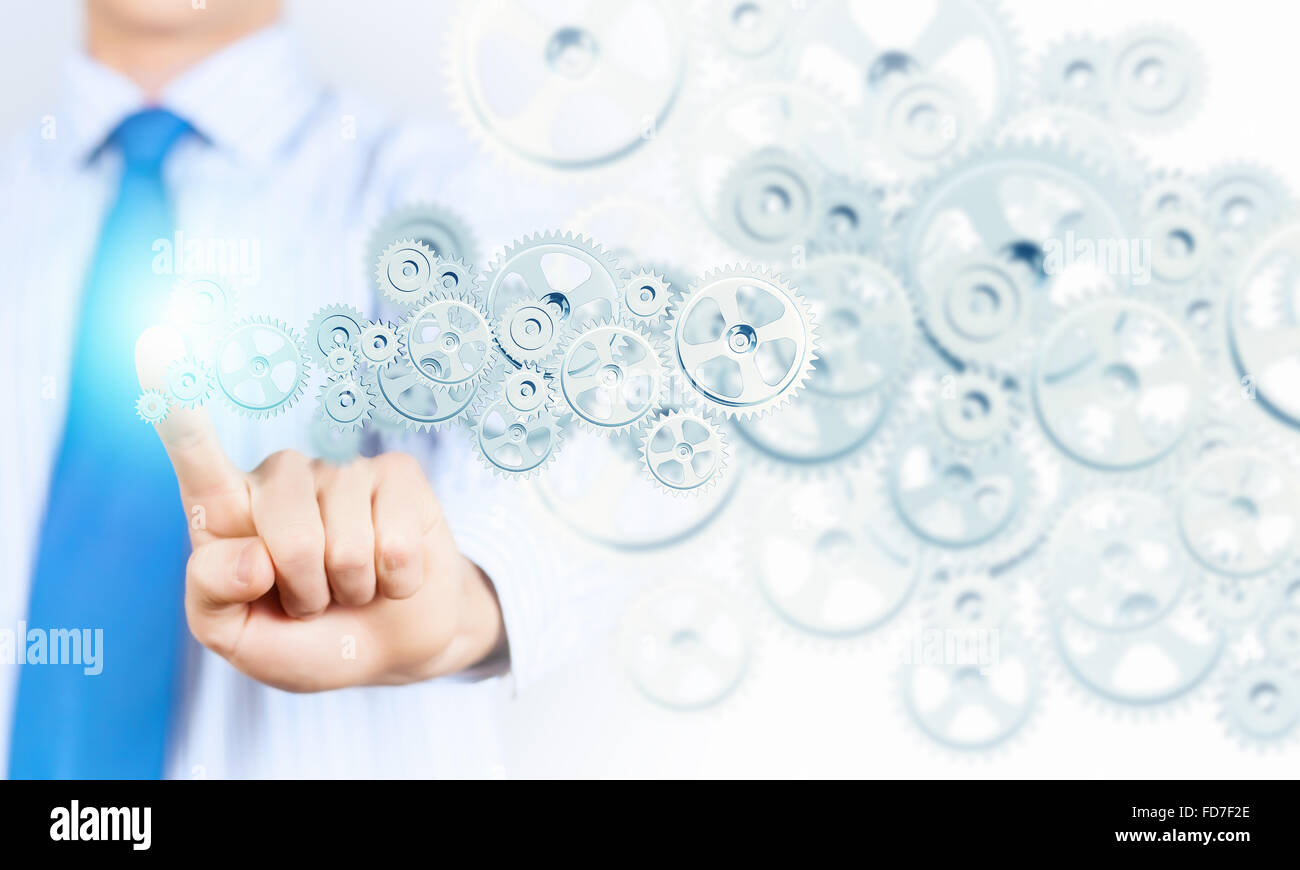 Close businessman touching gear mechanism hi-res stock photography and ...