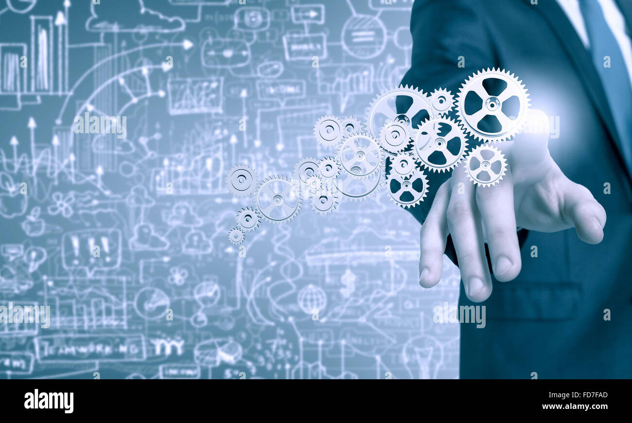 Close businessman touching gear mechanism hi-res stock photography and ...