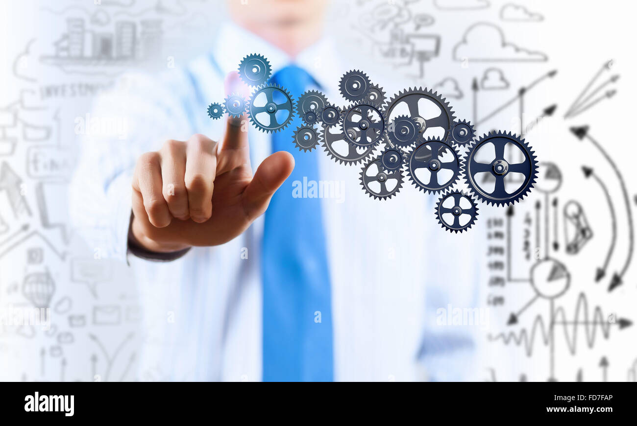 Close businessman touching gear mechanism hi-res stock photography and ...