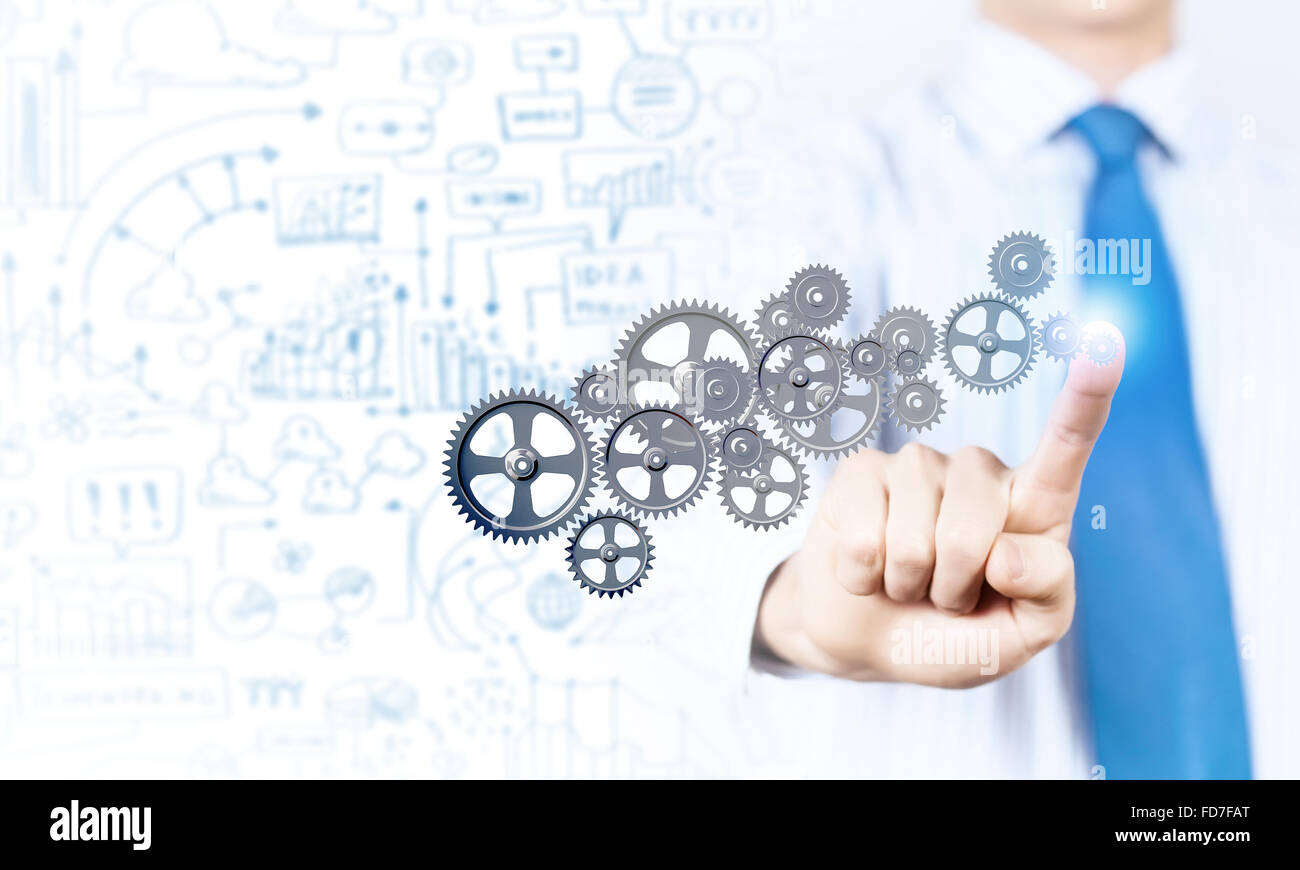 Close businessman touching gear mechanism hi-res stock photography and ...
