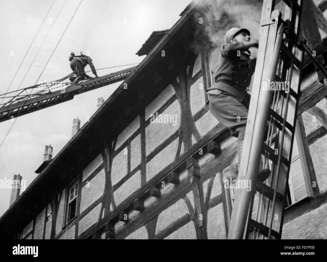 With some his helpers Black and White Stock Photos & Images - Alamy