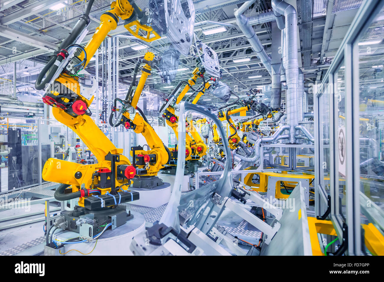 robots in a car plant Stock Photo - Alamy