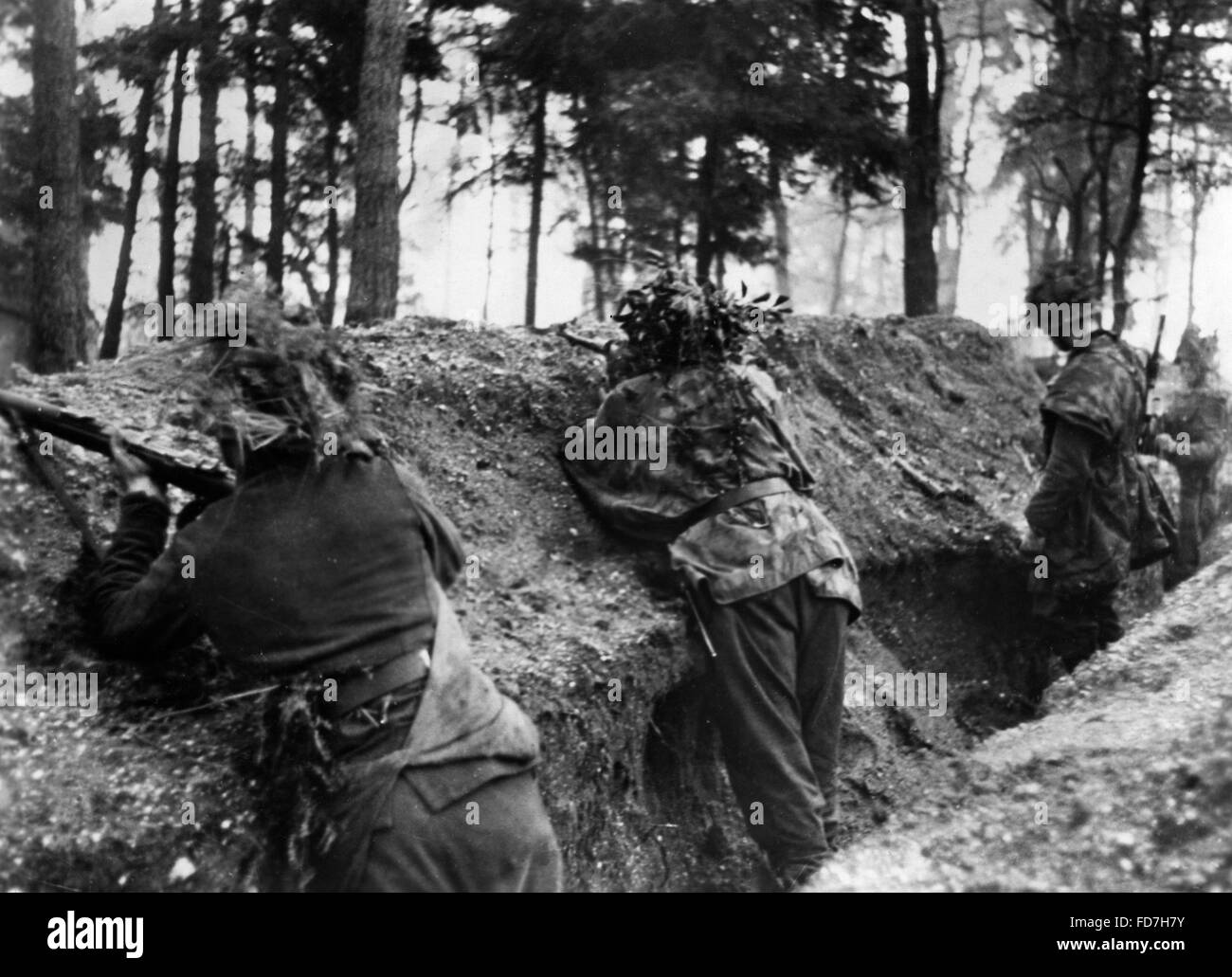 Wehrmacht soldiers in a trench on the Western Front, 1945 Stock Photo ...