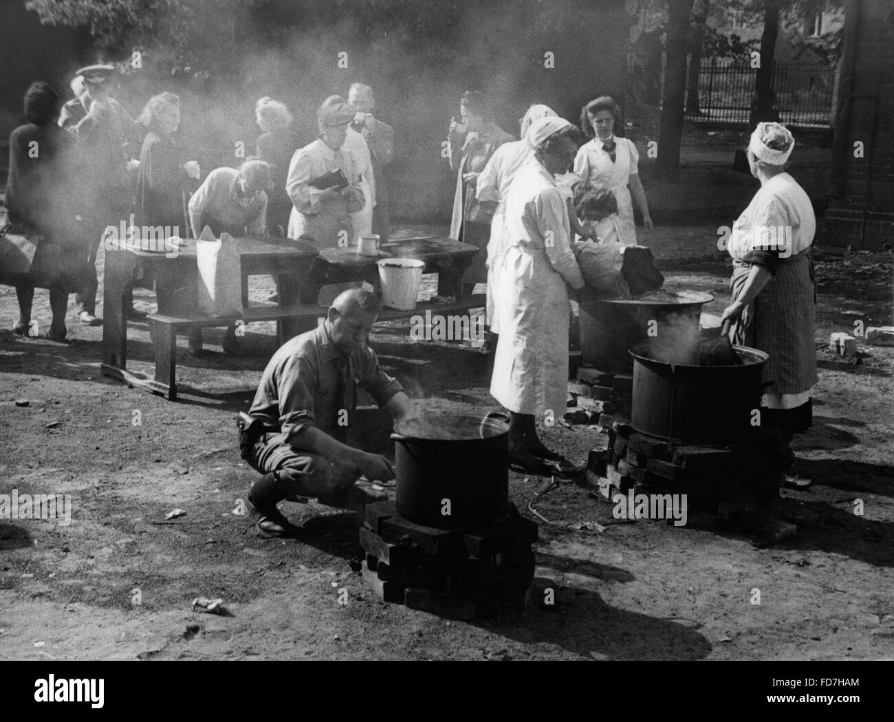 Meals for bomb victims, 1943 Stock Photo - Alamy