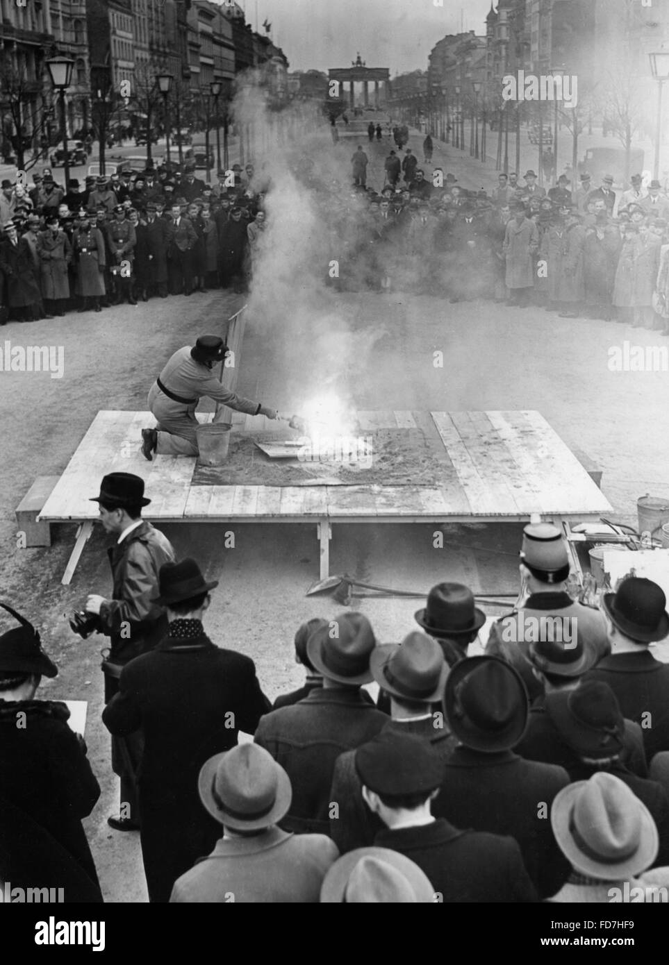 Demonstration of extinguishing firebombs in Berlin, 1941 Stock Photo ...