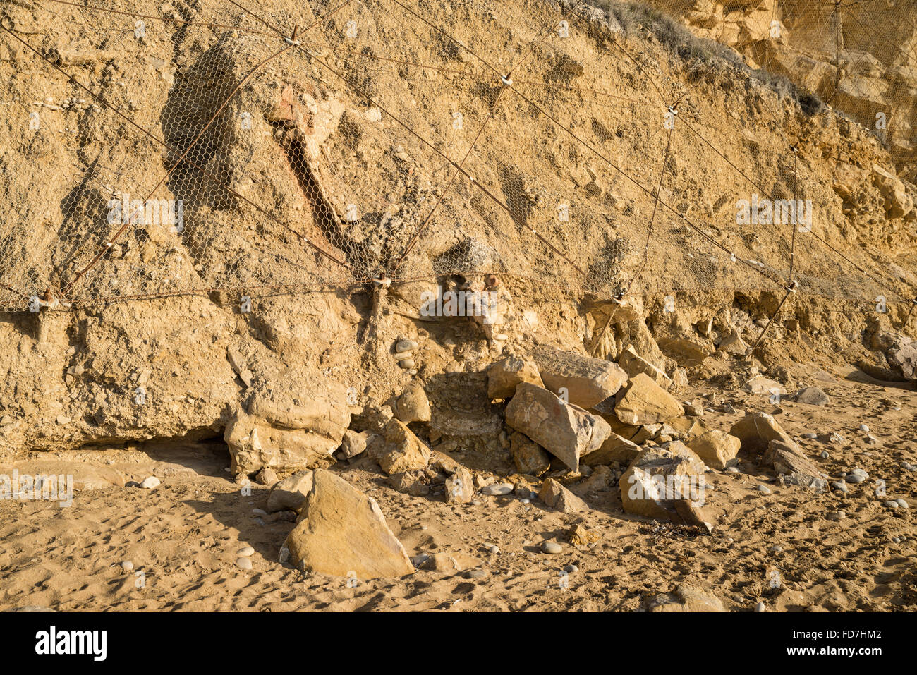 Heavy metal netting on a cliff to avoid falling rocks and landslides ...