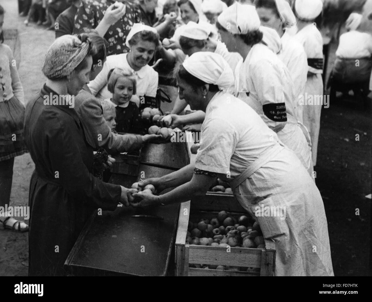 Food distribution to bomb victims, 1943 Stock Photo - Alamy