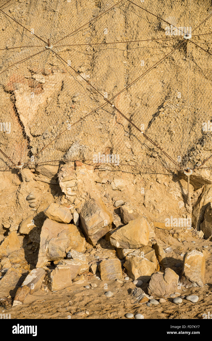 Heavy metal netting on a cliff to avoid falling rocks and landslides ...