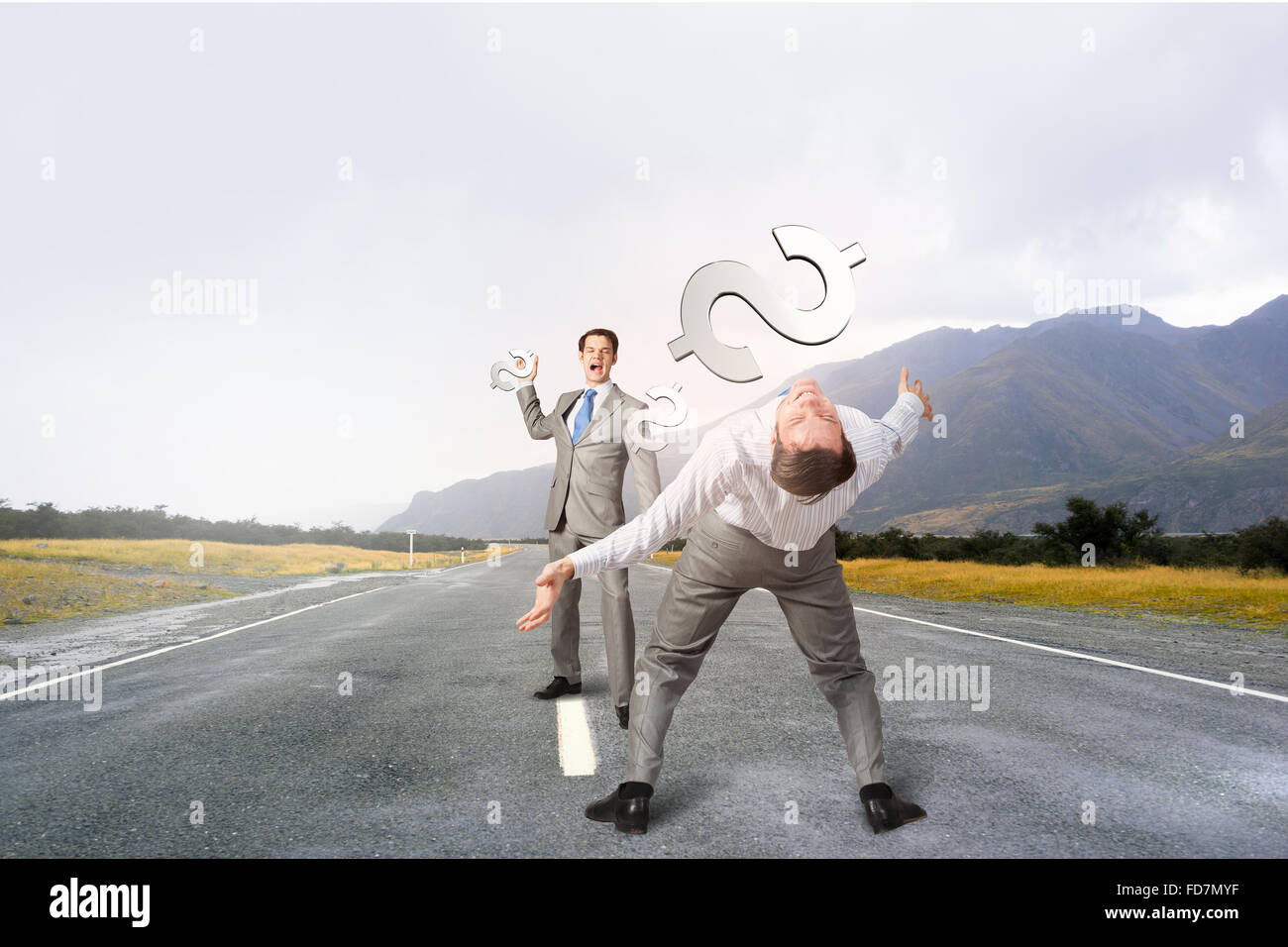 Young businessman benting to evade from thrown dollar sign Stock Photo ...