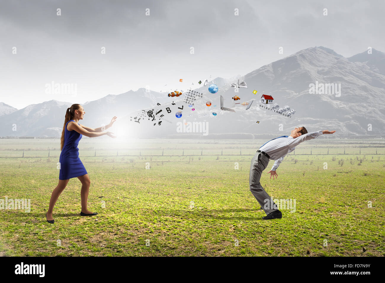 Young businessman trying to evade from thrown icons Stock Photo - Alamy