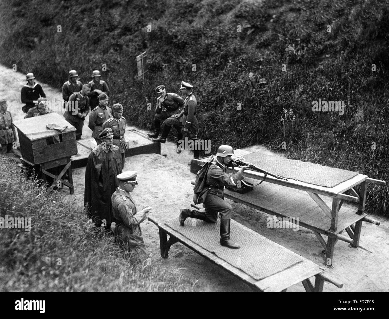 Soldiers shooting range Black and White Stock Photos & Images - Alamy