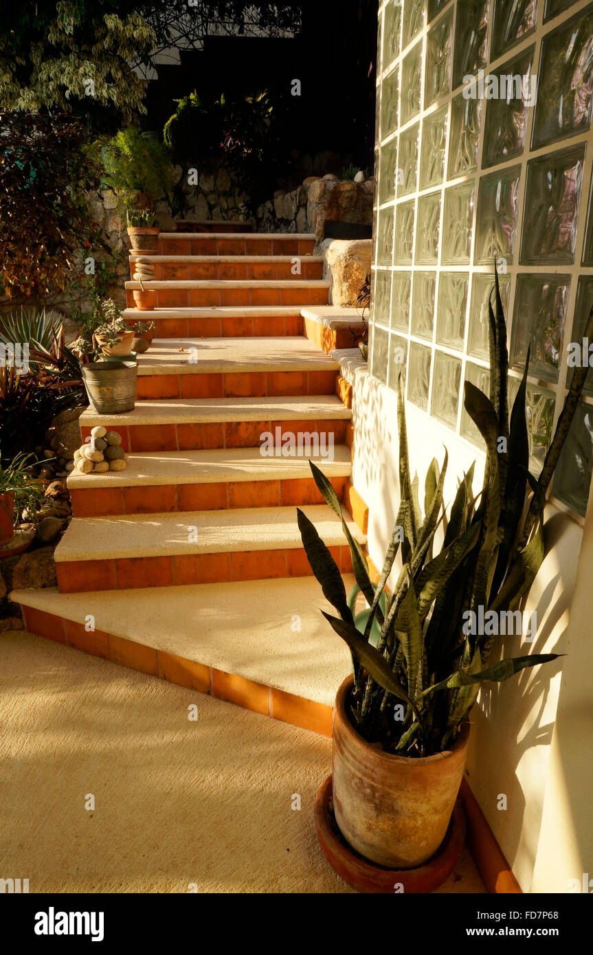 Cement and clay tile stairs in Mexican home Stock Photo - Alamy