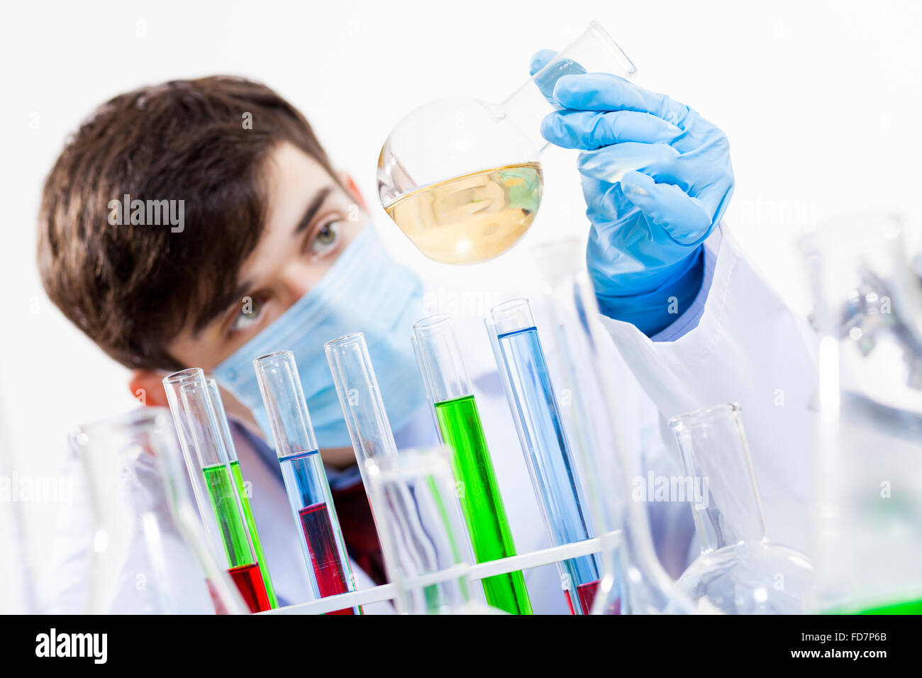 Young scientist making chemical tests in laboratory Stock Photo - Alamy