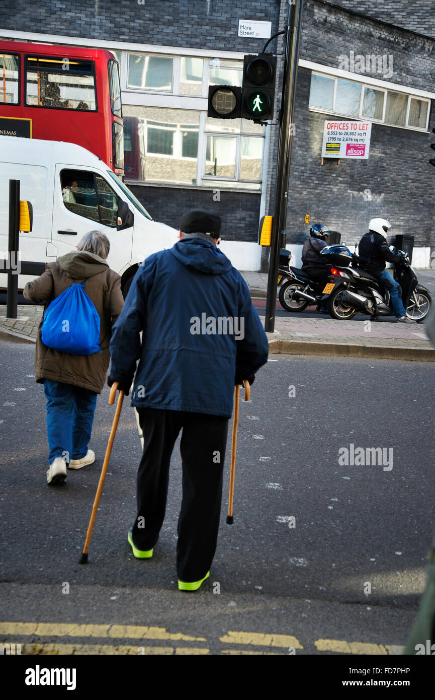 Elderly people crossing road hi-res stock photography and images - Alamy