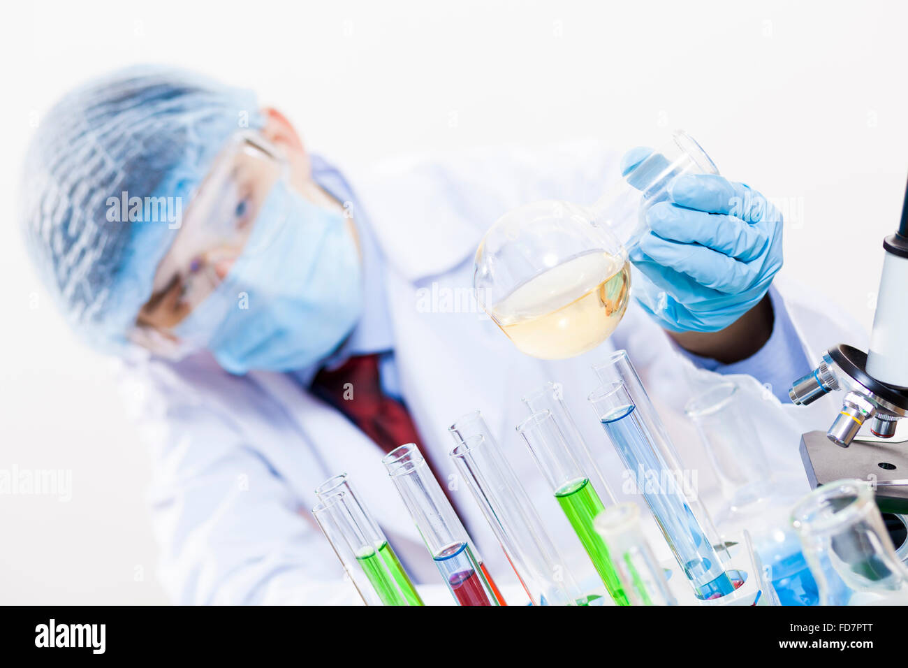 Young scientist making chemical tests in laboratory Stock Photo - Alamy