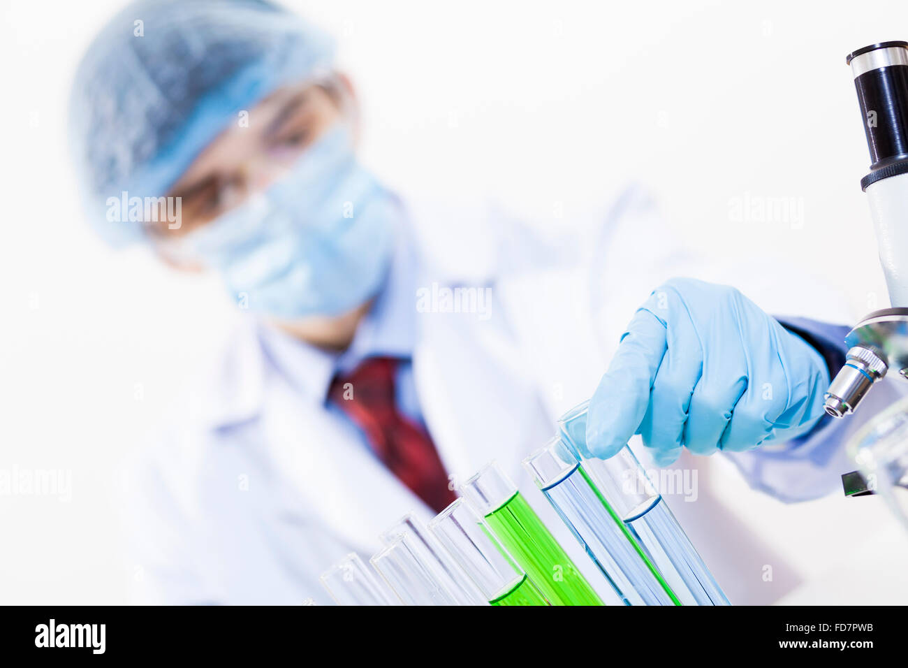 Young scientist making chemical tests in laboratory Stock Photo - Alamy