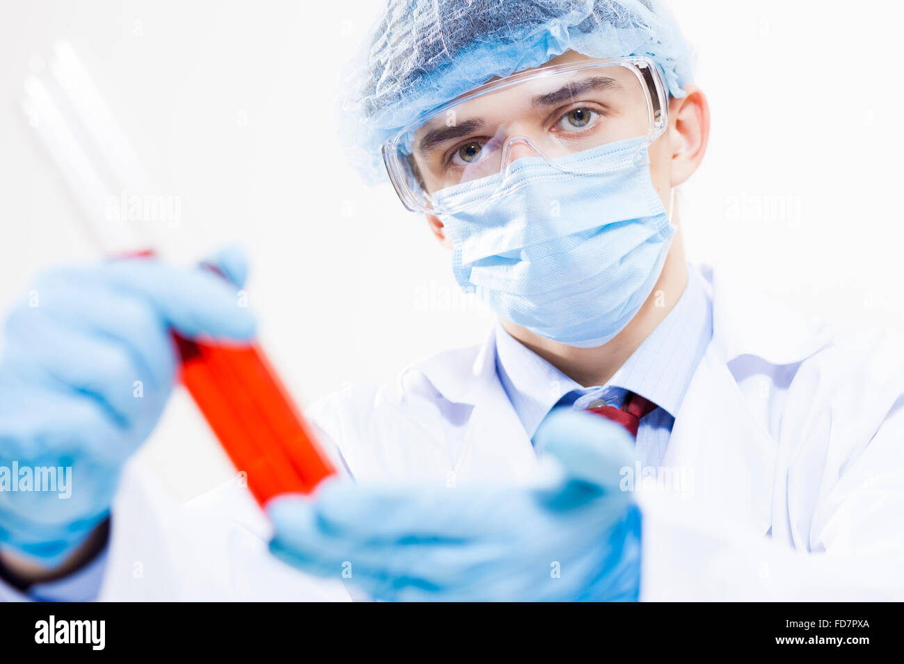 Young scientist making chemical tests in laboratory Stock Photo - Alamy