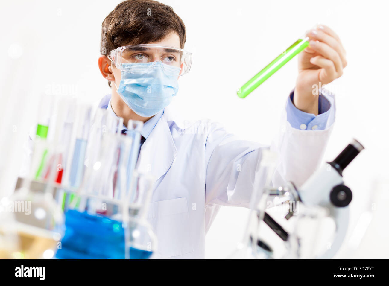Young scientist making chemical tests in laboratory Stock Photo - Alamy