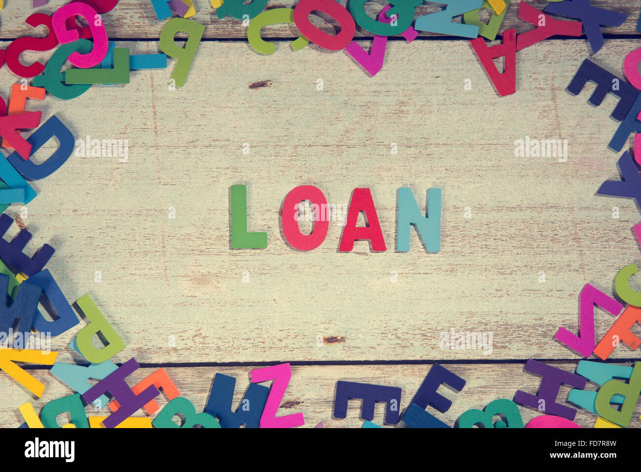 loan word block concept photo on plank wood Stock Photo - Alamy